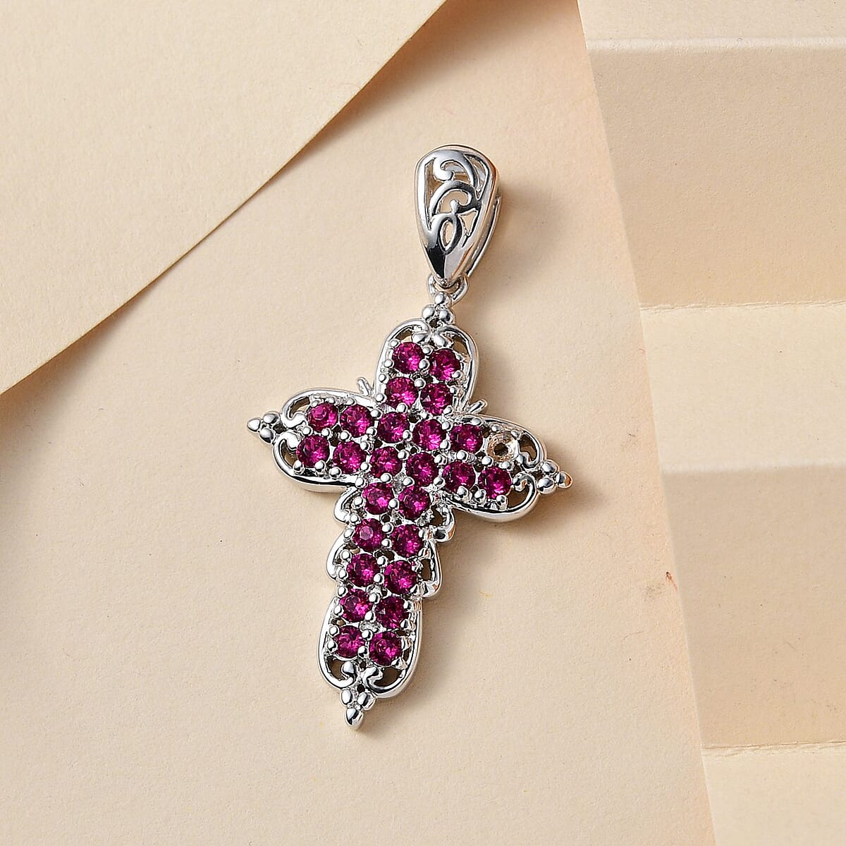 Buy Karis Fuchsia Color Crystal Cross Pendant in Platinum Bond at ShopLC.