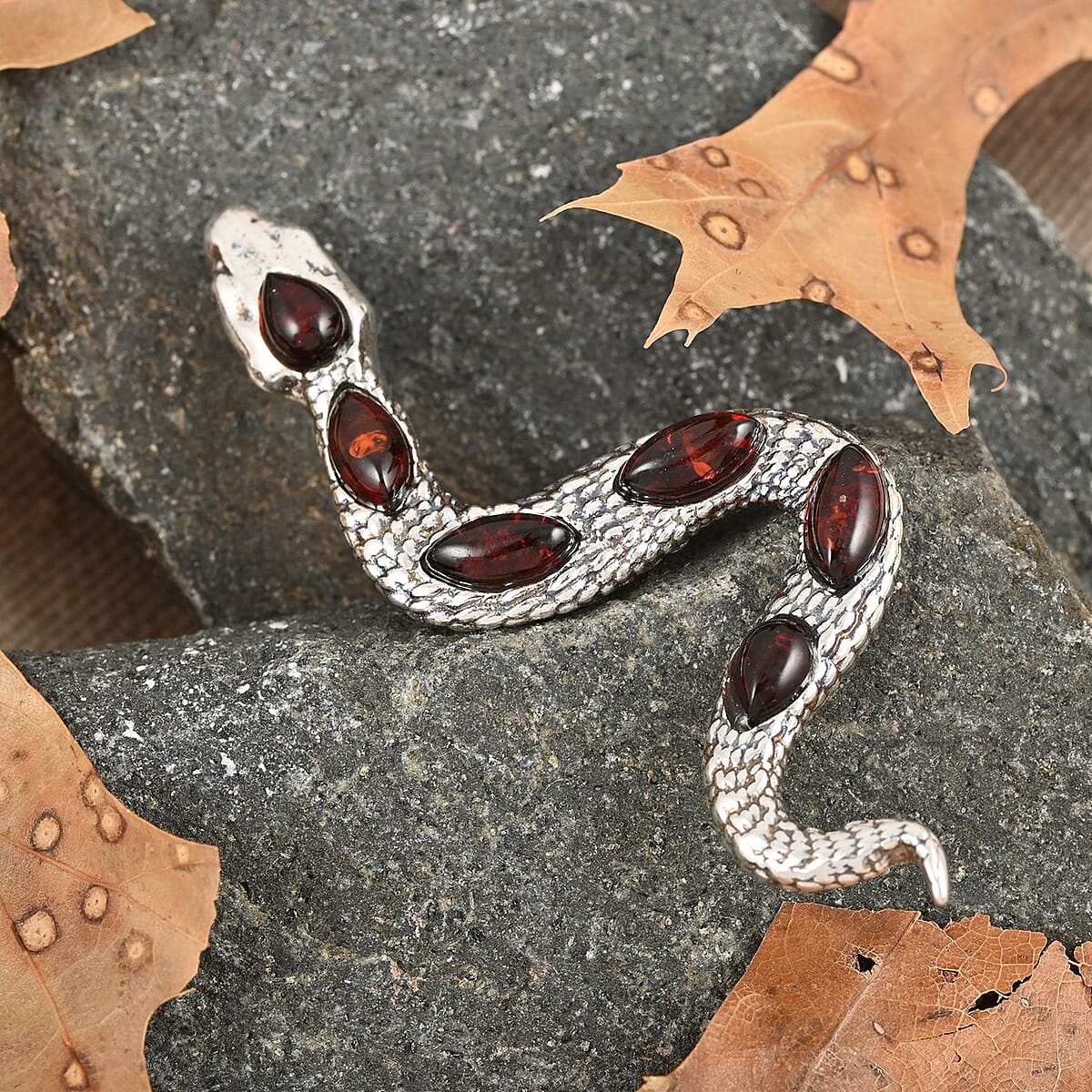 Buy altic Cherry Colored Amber Snake Pendant in Sterling Silver at ShopLC.